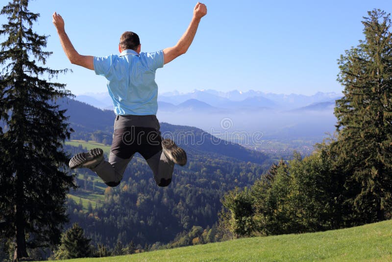 Jumping up in spring time stock photo. Image of dream - 68876928