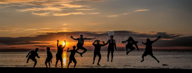 Jumping Up To the Setting Sun Stock Image - Image of holiday, excited ...