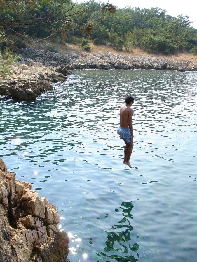 Jumping in water stock photo. Image of excited, adventure - 1040448