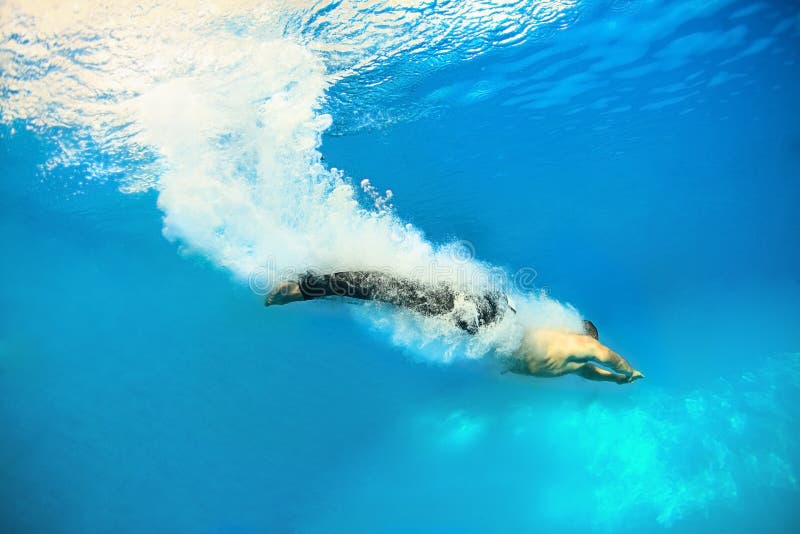 Jumping into water stock image. Image of athlete, energy - 25568475
