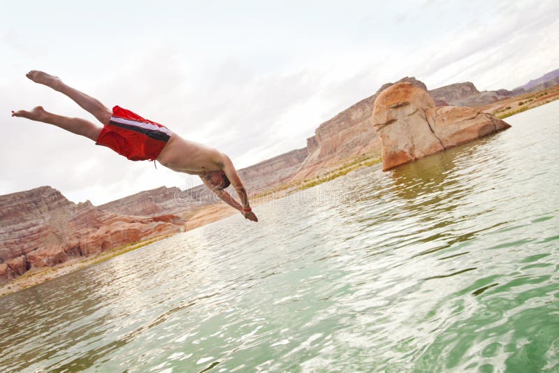 Jumping in the Water and Playing in the Lake Stock Photo - Image of ...
