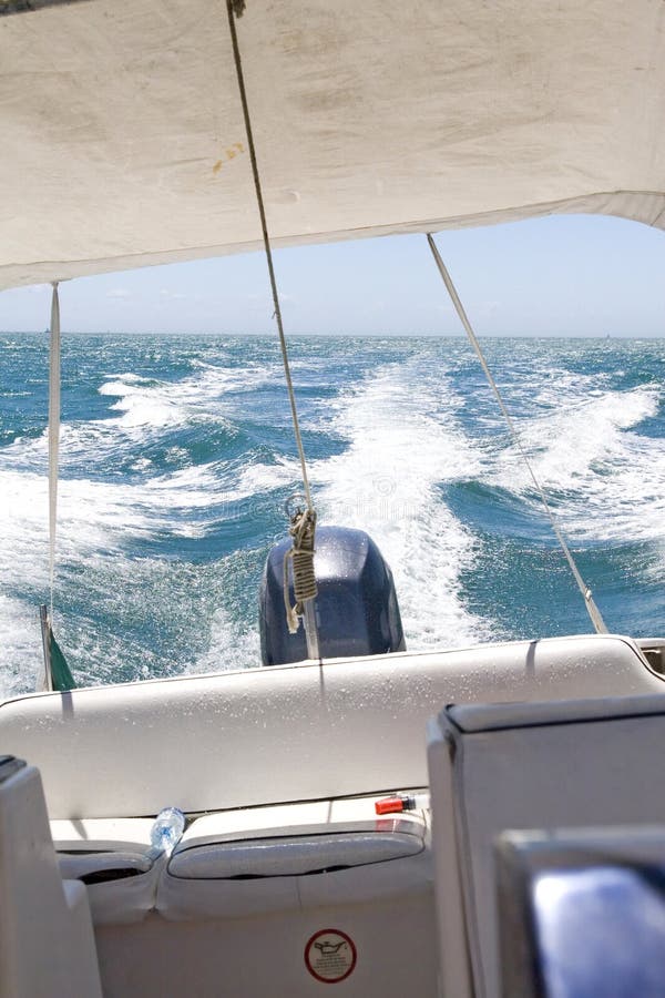 Splashing the boat stock photo. Image of power, boat, couple - 61518