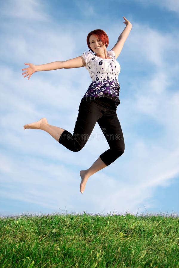 Jumping Woman stock image. Image of clouds, jump, freedom - 10790457