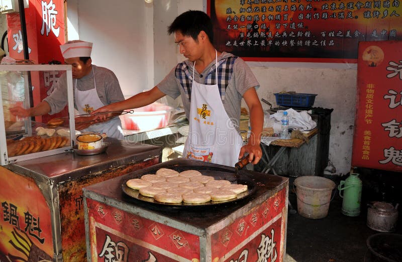 Jun Le, China: Cooking Chinese Pizza Editorial Stock Photo - Image of ...