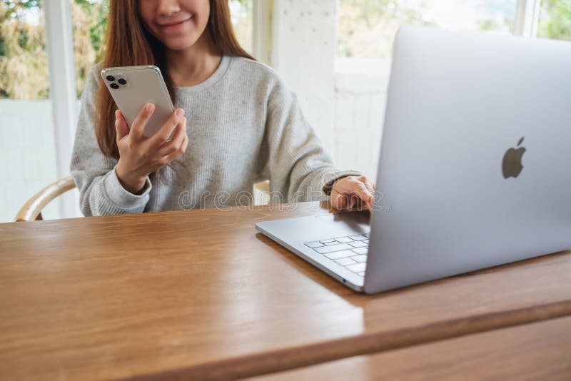 Jun 16th 2020 : a Woman Using Iphone 11 Pro Max Smart Phone and Apple ...
