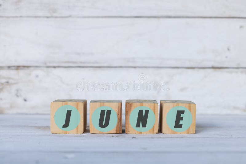 June Concept Written on Wooden Cubes or Blocks, on White Wooden ...