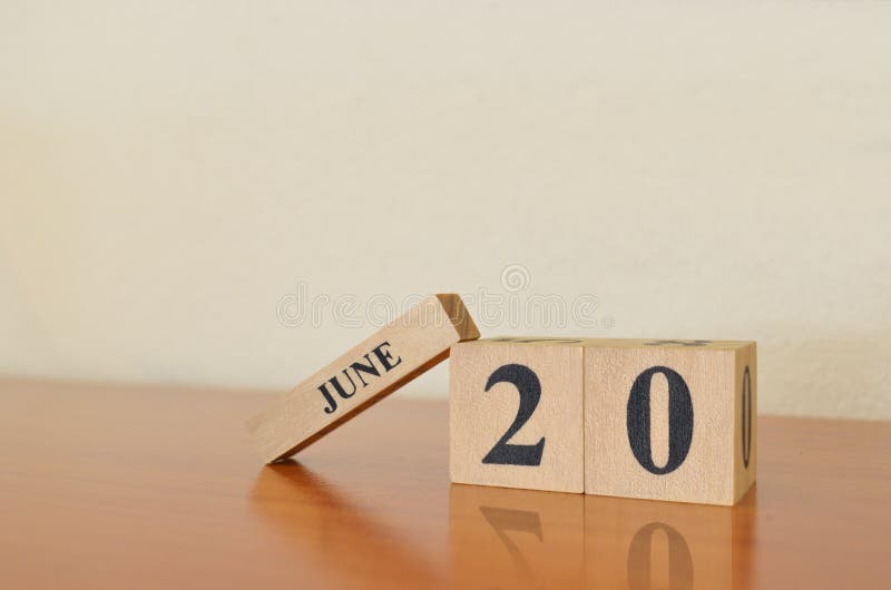 June 20, Date Design with Calendar Cube on Wooden Table Background ...