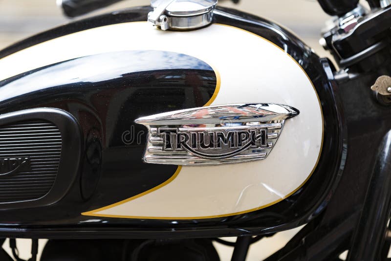 Triumph Motorcycle Emblems on the Streets of Milan in Italy. Editorial ...