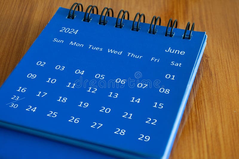 June 2024 Table Calendar on Wooden Desk. Time and Calendar Concept ...