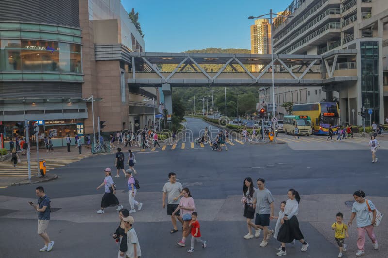 June 7 2025 Urban Intersection with Pedestrians and Modern Building ...