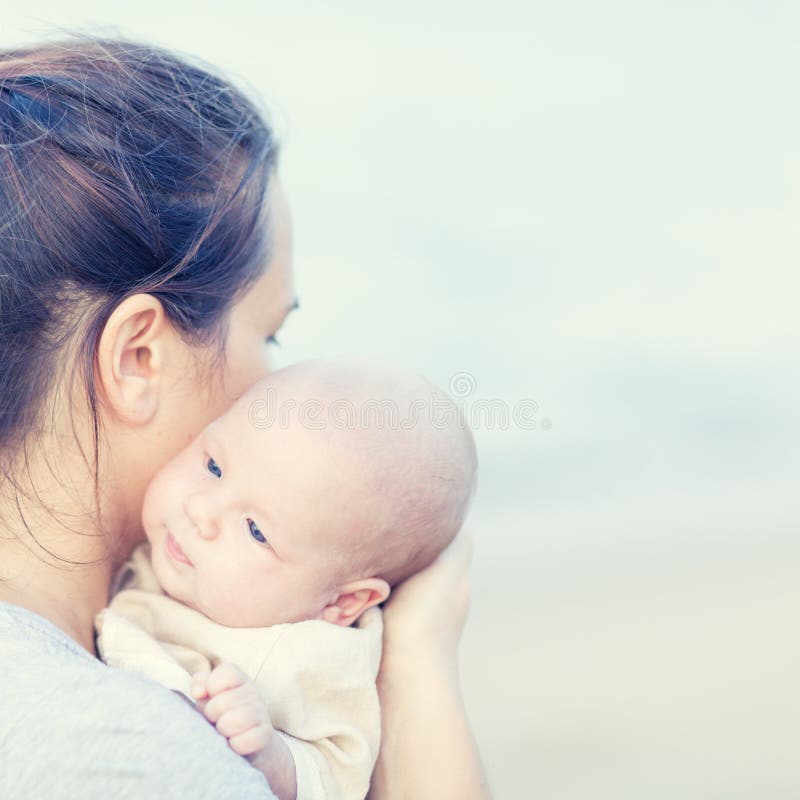 Mom and Baby Boy Outdoor. Mother Hug Little Son with Love. Woman with ...