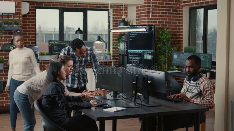 Junior Developer Putting Laptop with Source Code on Senior Dev Desk Asking for Opinion Stock ...