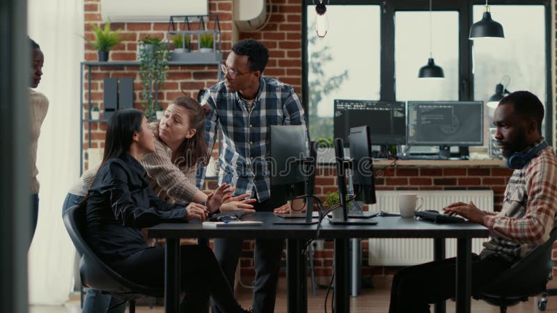 Junior Developers Collaborating on Group Project Compiling Algorithm Asking Senior Programer for ...