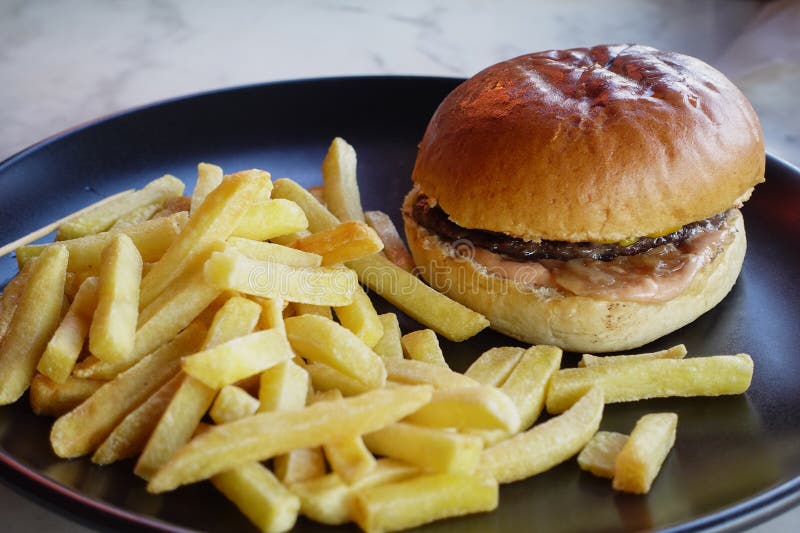 Junk Foods on Plate on Wooden Table Close Up Stock Photo - Image of ...