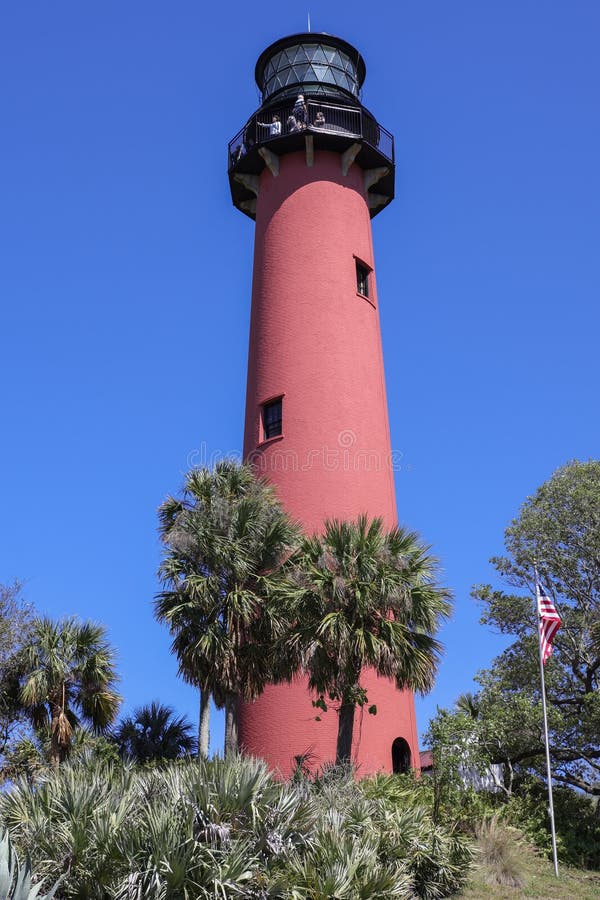 Juno Beach Lighthouse stock image. Image of spire, plant - 385809543