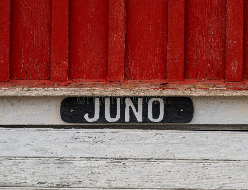 Juno Sign on Black on a Red House.. Stock Image - Image of concept ...