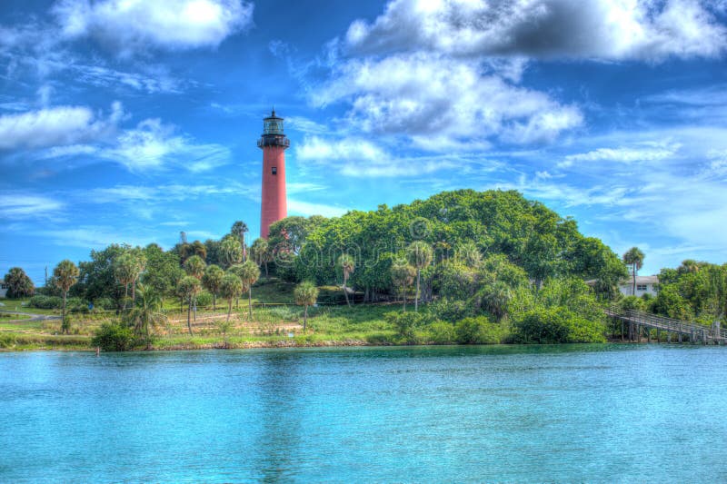 Jupiter Inlet Lighthouse with Blue Skys and Clouds Stock Image - Image ...