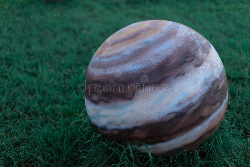 Jupiter Planet Model on Green Grass. Science, Astronomy Concept Stock ...