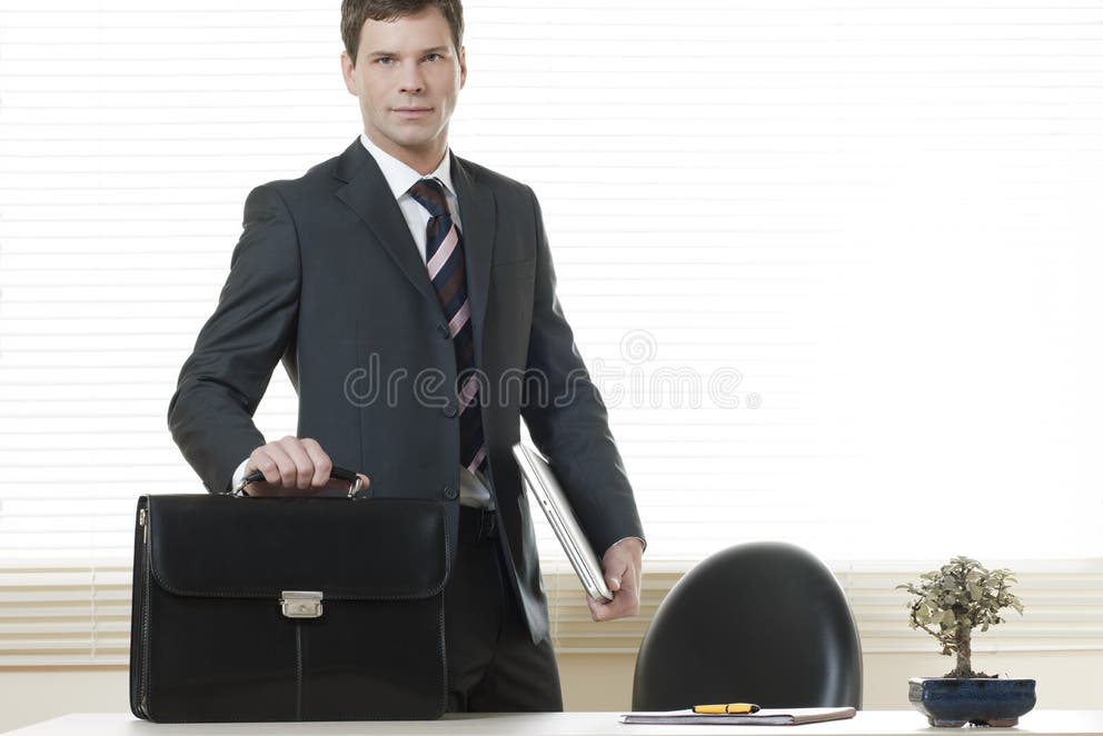 Just Arrived in the Office/Ready To Go Home Stock Photo - Image of ...