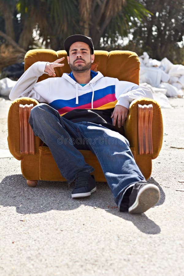 Just Chillin. a Guy with Attitude Relaxing on a Couch that is Situated ...