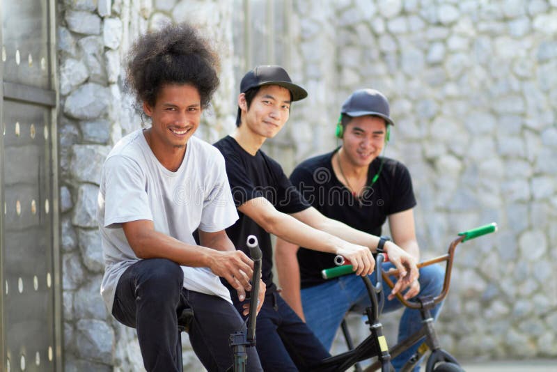 Just Chilling between Tricks. a Group of Young Bmx Riders Relaxing ...