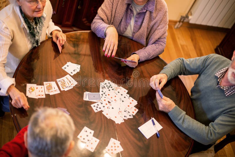 Just a Friendly Card Game between Old Friends Stock Photo - Image of ...