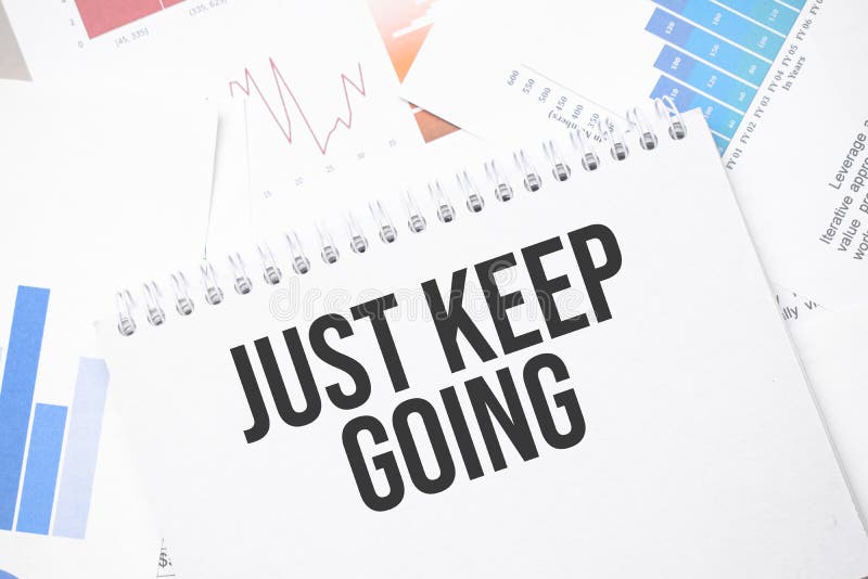 Just Keep Going Text on Paper on the Chart Background with Pen Stock ...