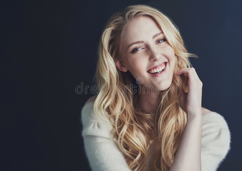 Just Keep Smiling. Studio Portrait of a Smiling Young Woman Isolated on ...