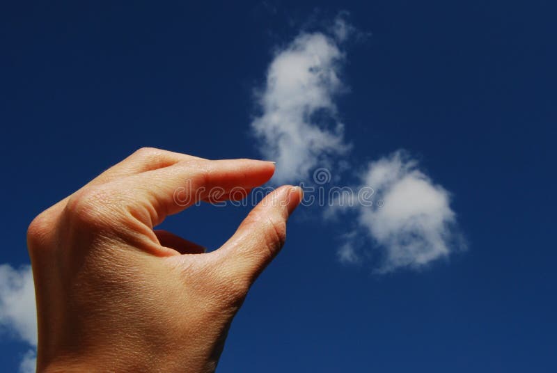 Just a Little Pinch - Left Hand Stock Image - Image of pluck, fluffing ...