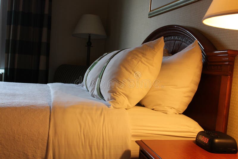 Just Made Bed and Fluffy Pillows in Hotel Stock Photo - Image of stay ...