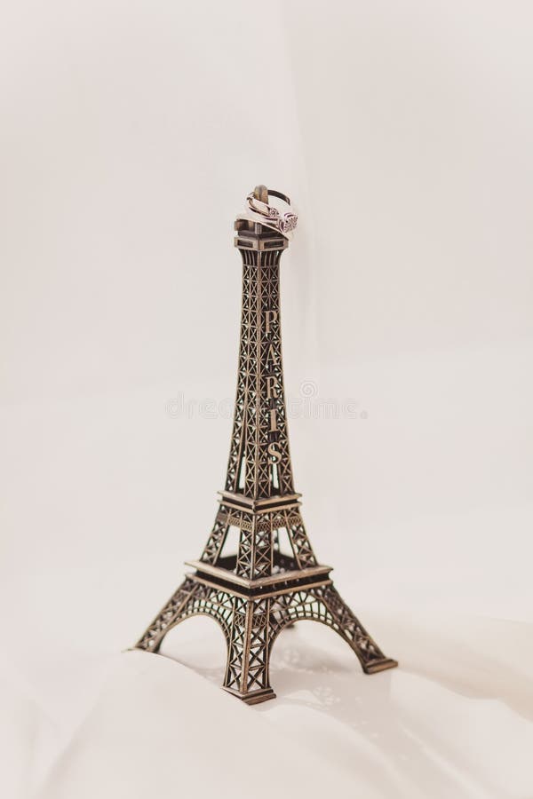 Just Married in Paris. Two Wedding Rings on a Miniature Eiffel Tower ...
