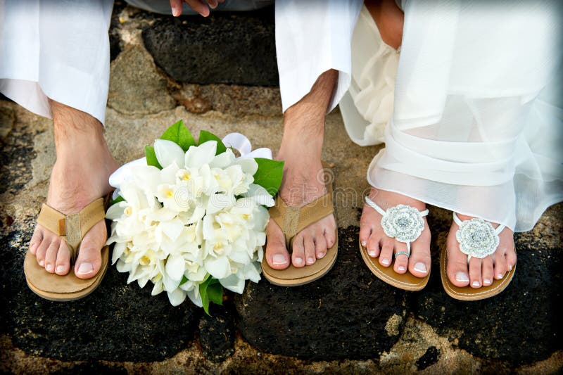 Bride on grooms feet stock photo. Image of atumn, bouquet - 35980574