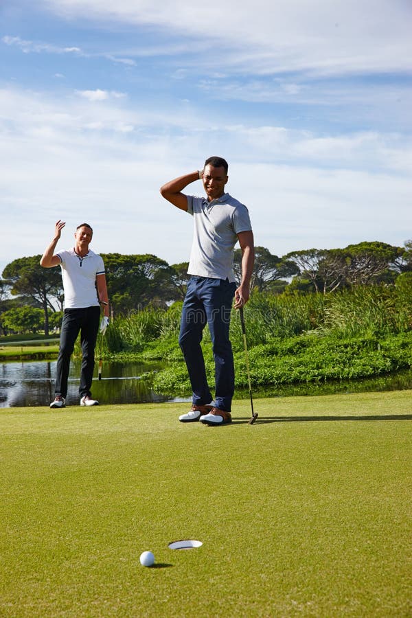 Just Missed it. Two Frustrated Men on the Putting Green. Stock Photo ...