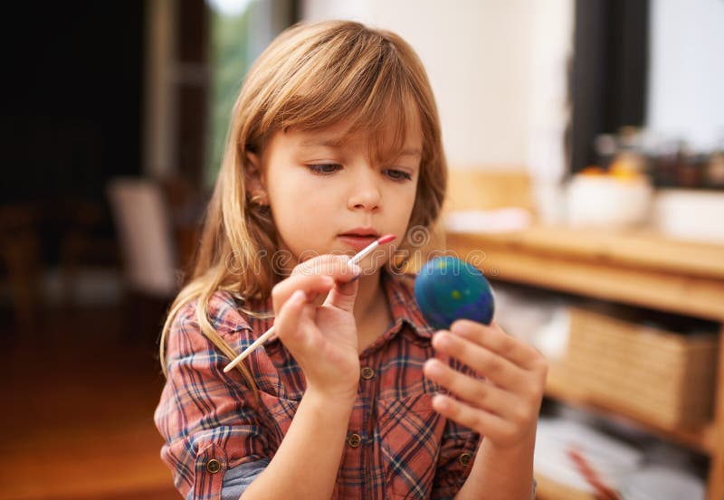 Just One More Dot Right Here...a Little Girl Painting an Easter Egg ...