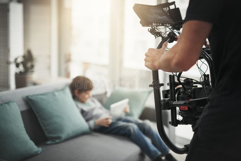 Just One More Shot. Behind the Scenes Over the Shoulder Shot of an ...