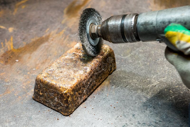 Just produced gold ingot stock photo. Image of extraction - 87712958