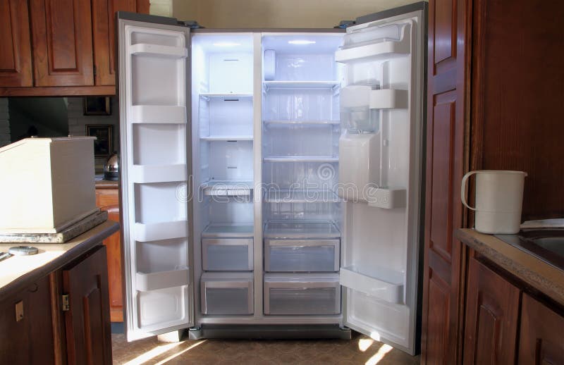 Just Unpacked New Refrigerator with Empty Shelves Stock Photo - Image ...