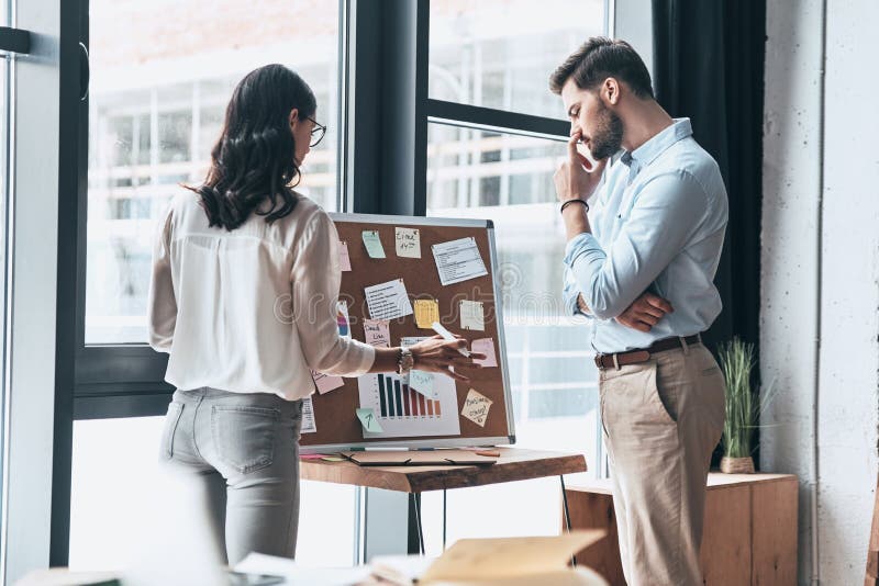 Just Working Day. Two Young Business People Using Blackboard Wit Stock ...