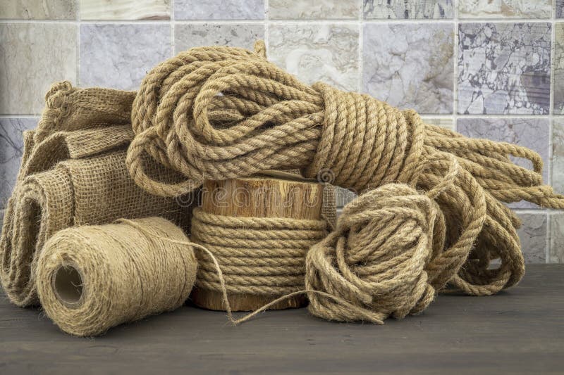 Jute Rope and Spools of Burlap Threads or Twine Stock Photo - Image of ...