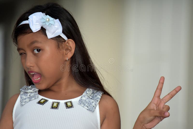 Juvenile and Peace Sign stock image. Image of youth - 152091603