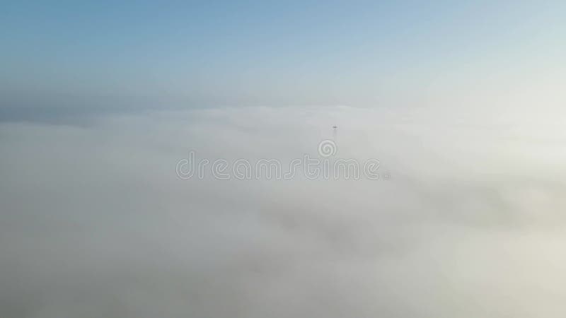 4K Aerial Drone Arc Orbit Around Tower, Above Low Clouds and Fog Stock ... 4K Aerial Drone Arc Orbit Around Tower, Above Low Clouds and Fog Stock ...