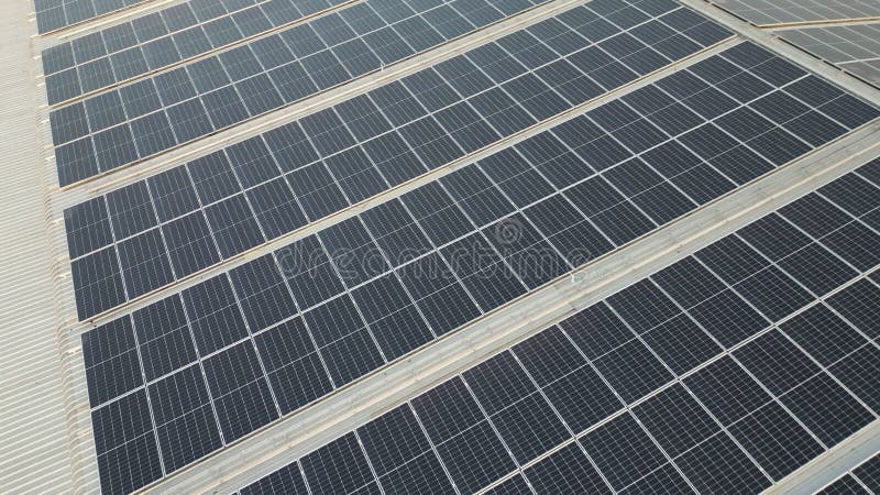 4K Aerial View of Solar Panels Installed on Roof of Warehouse Stock ...