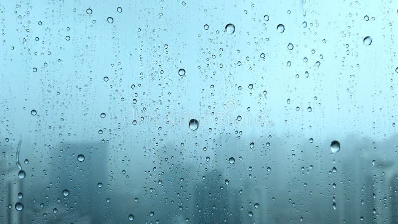 4K: Close Up of Rain Drops on an Office Window Stock Footage - Video of ...