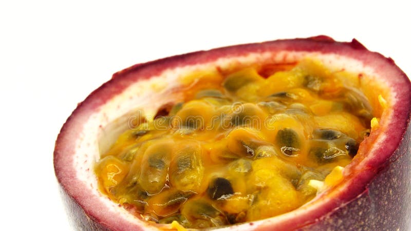 4K Cross-section of a Puple Passion Fruit Macro Shot of Sliced Fresh ...