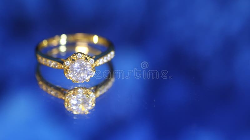 24k Gold Diamond Ring with White Background Stock Photo - Image of ...