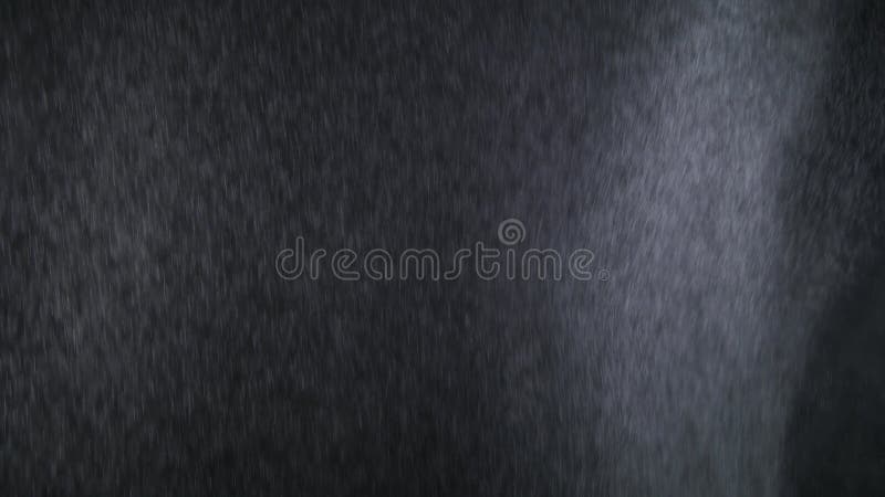 4k Heavy Angled Rain Falling in Front of the Camera Against Black ...