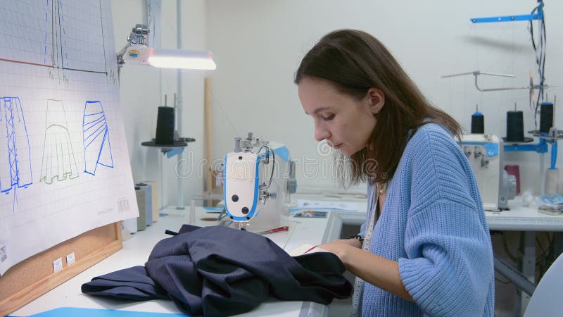 4K. the Master of Sewing Clothes in His Atelier Stock Video - Video of ...