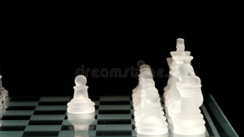 4K. Pawn Move on the Chessboard. Black Background Stock Footage - Video ...