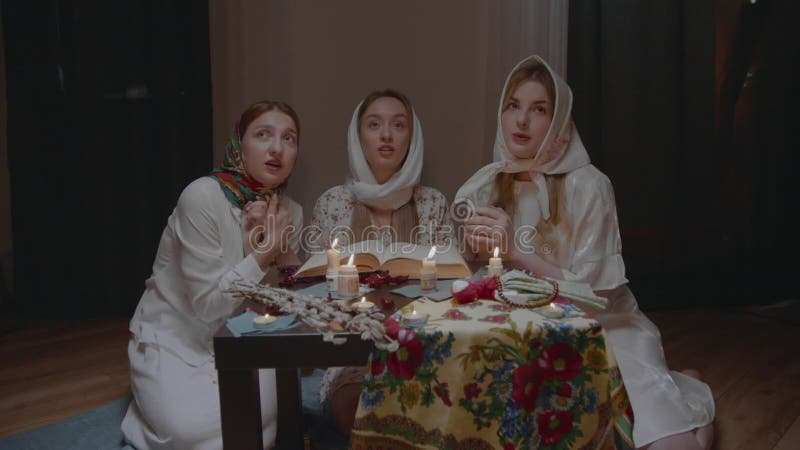 4K. Slavic Women Saw a Ghost Stock Video - Video of burn, candlelight ...