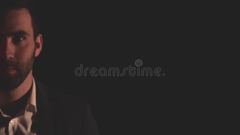 4k Slow Motion Video of Man in Shadow and Orange Light on the ...